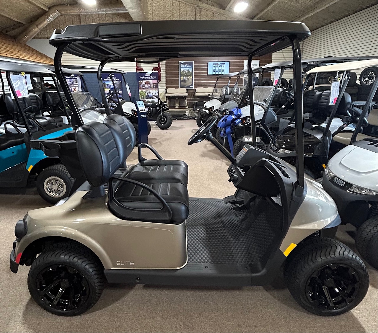 2025 E-Z-GO RXV (Almond, Lithium) – Golfmart